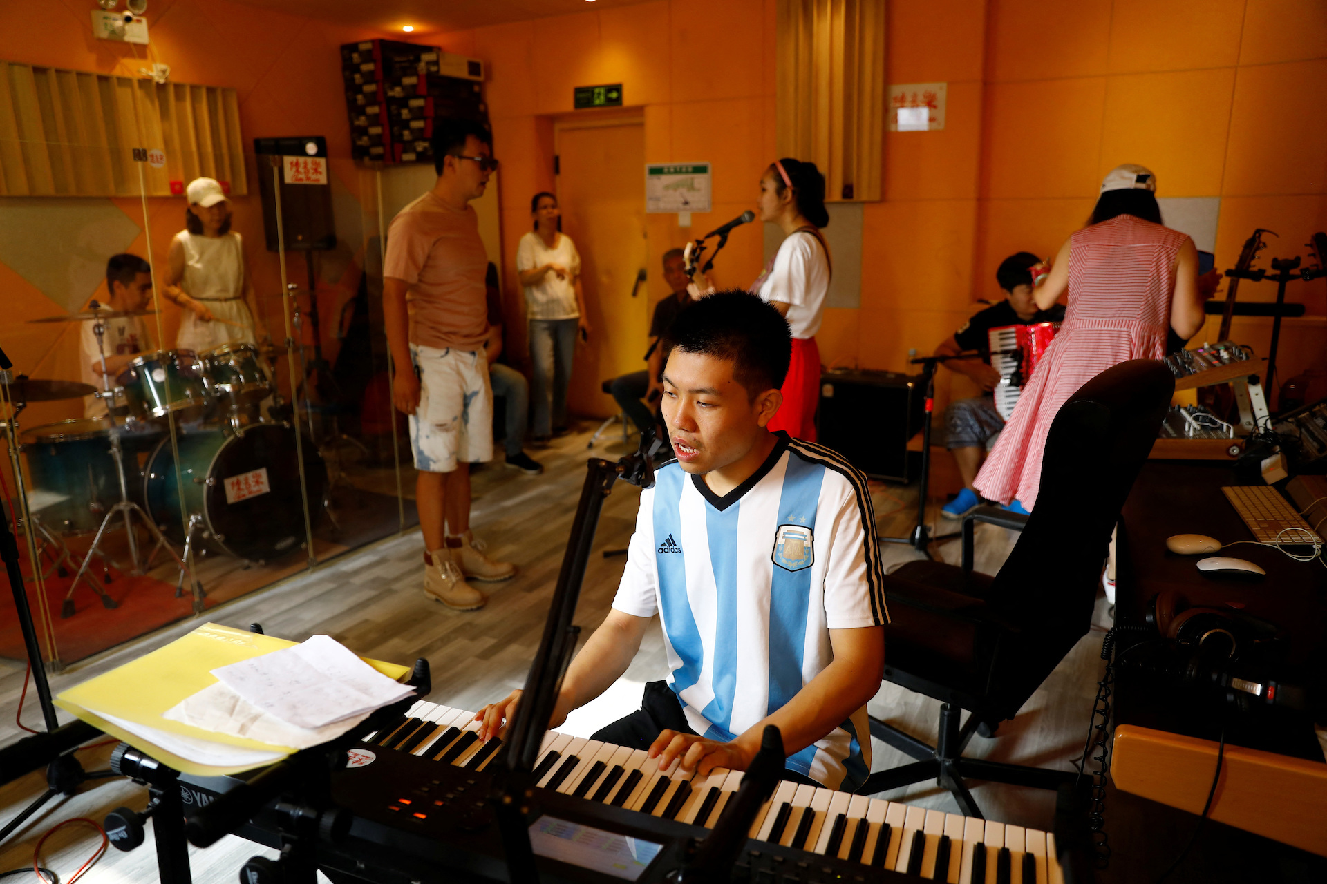 ‘Music Is Their Language’: School Gives Autistic Chinese Youth a Voice ...